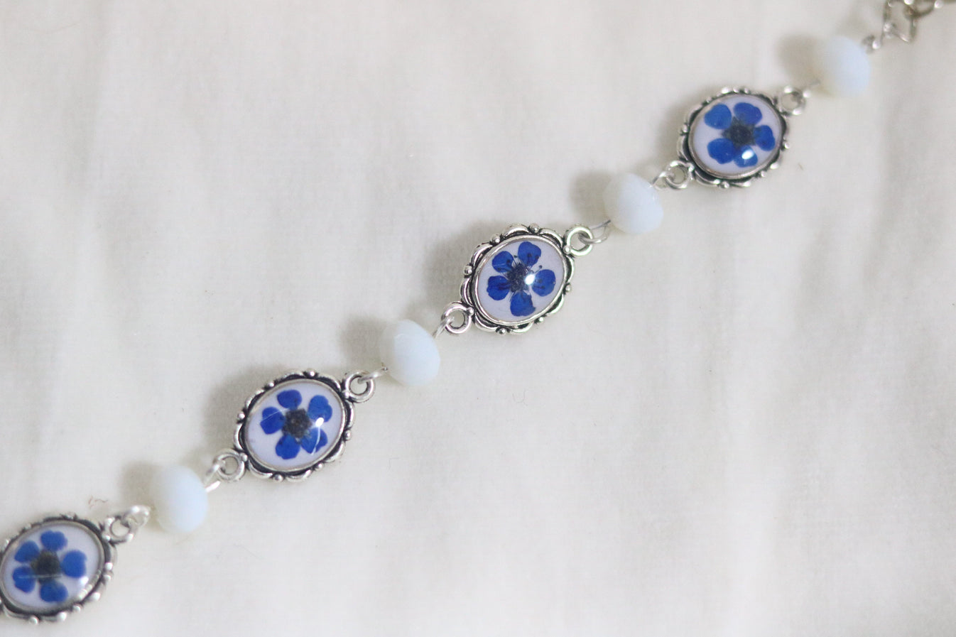 "Elegant Blue Flower Bracelet with Silver Chain & White Glass Beads ...